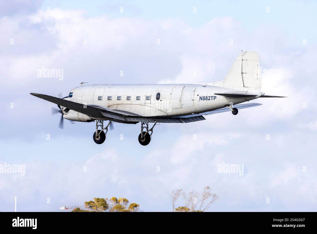 National Test Pilot School Douglas DC-3-65TP (REG: N882TP) on finals ...