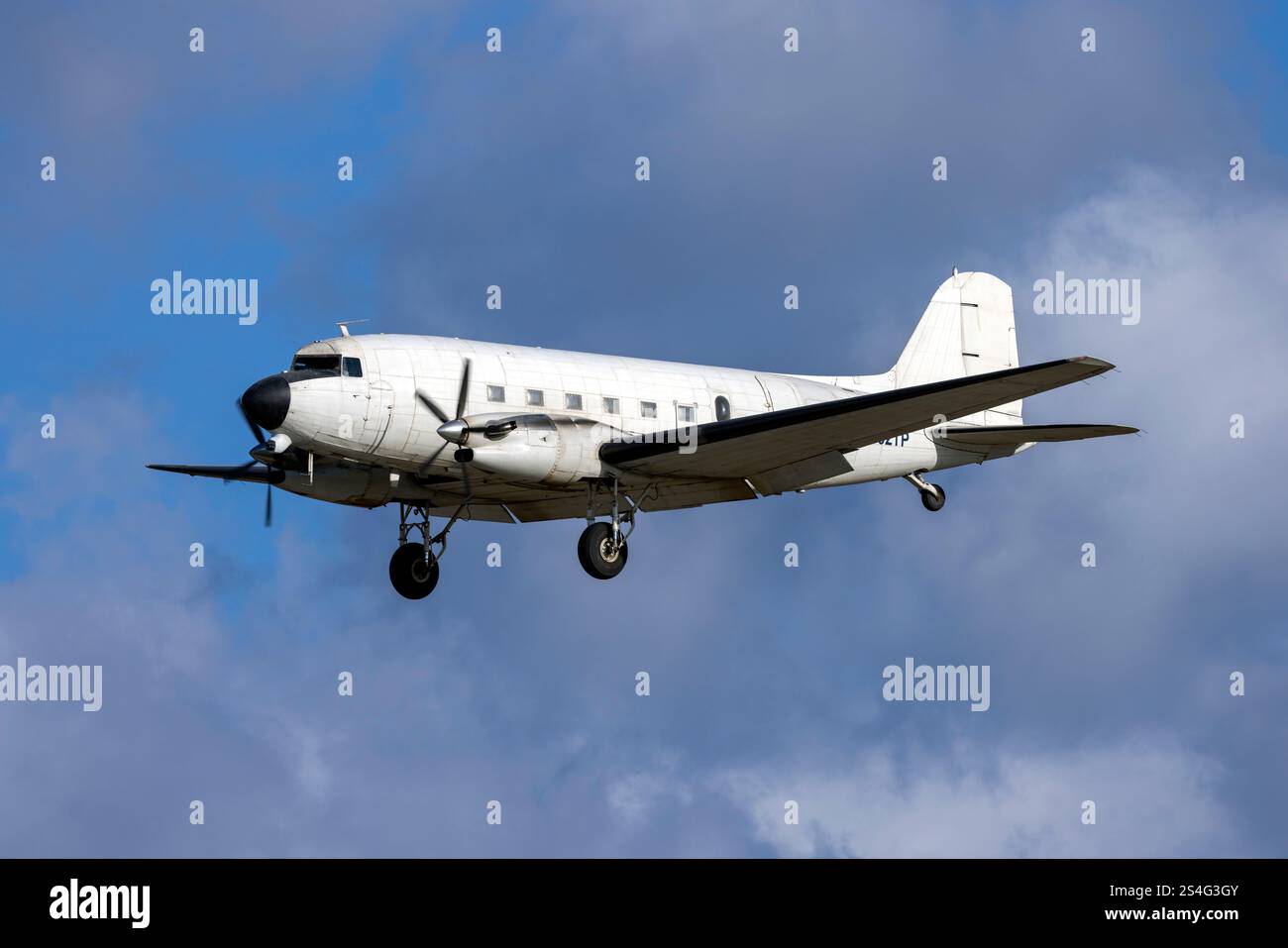 National Test Pilot School Douglas DC-3-65TP (REG: N882TP) on finals ...