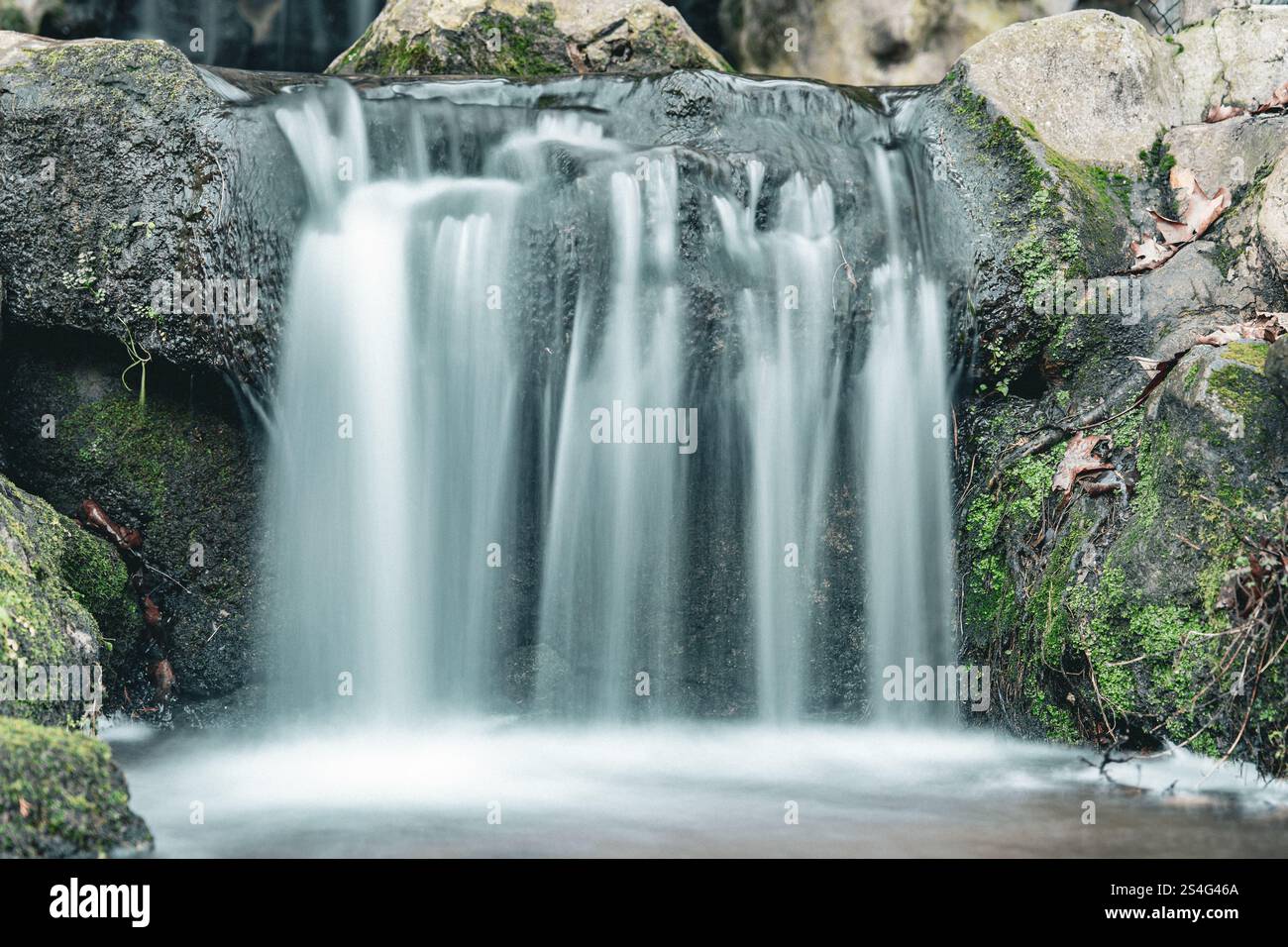 Water cascades gently over rocks hi-res stock photography and images ...