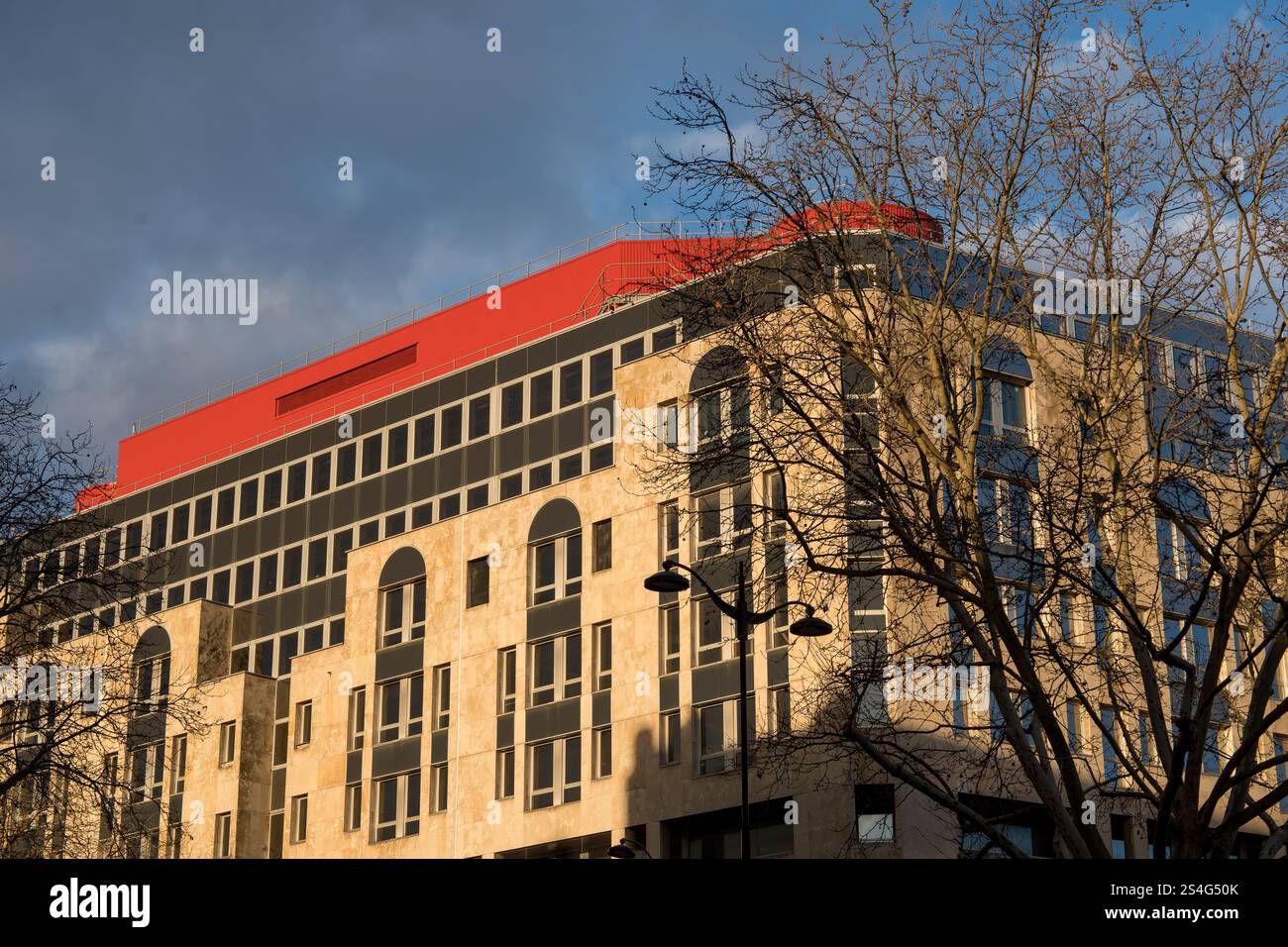 Modern architecture blends with nature at urban building under bright ...