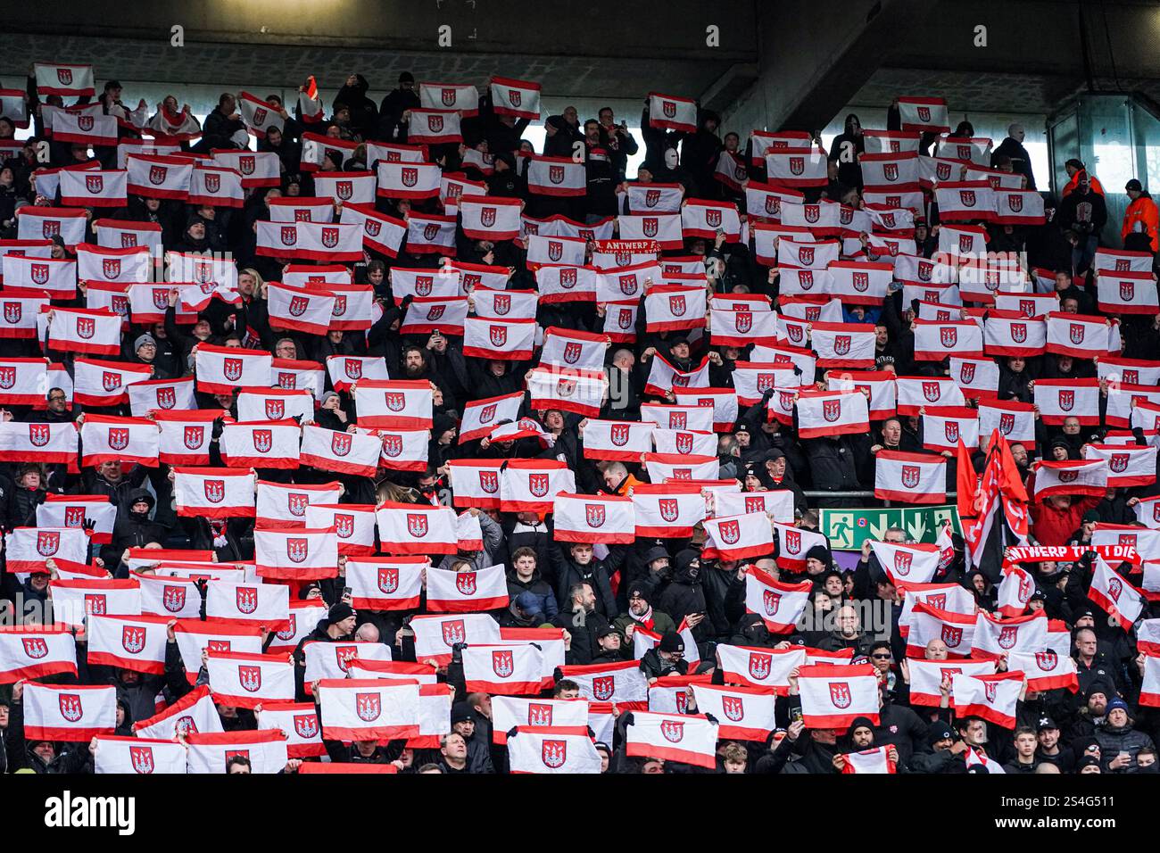 ANTWERPEN, BELGIUM - JANUARY 12: fans of Royal Antwerp FC with flags ...