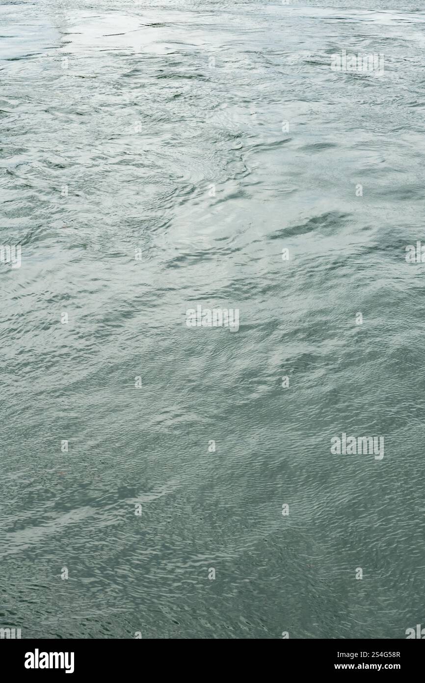 Abstract azure water surface with mild waves, vertical image Stock ...