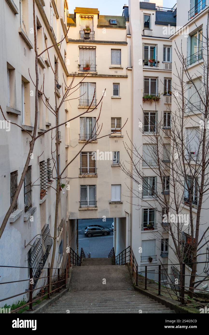 Charming urban staircase leading to a quiet street in Paris Stock Photo ...