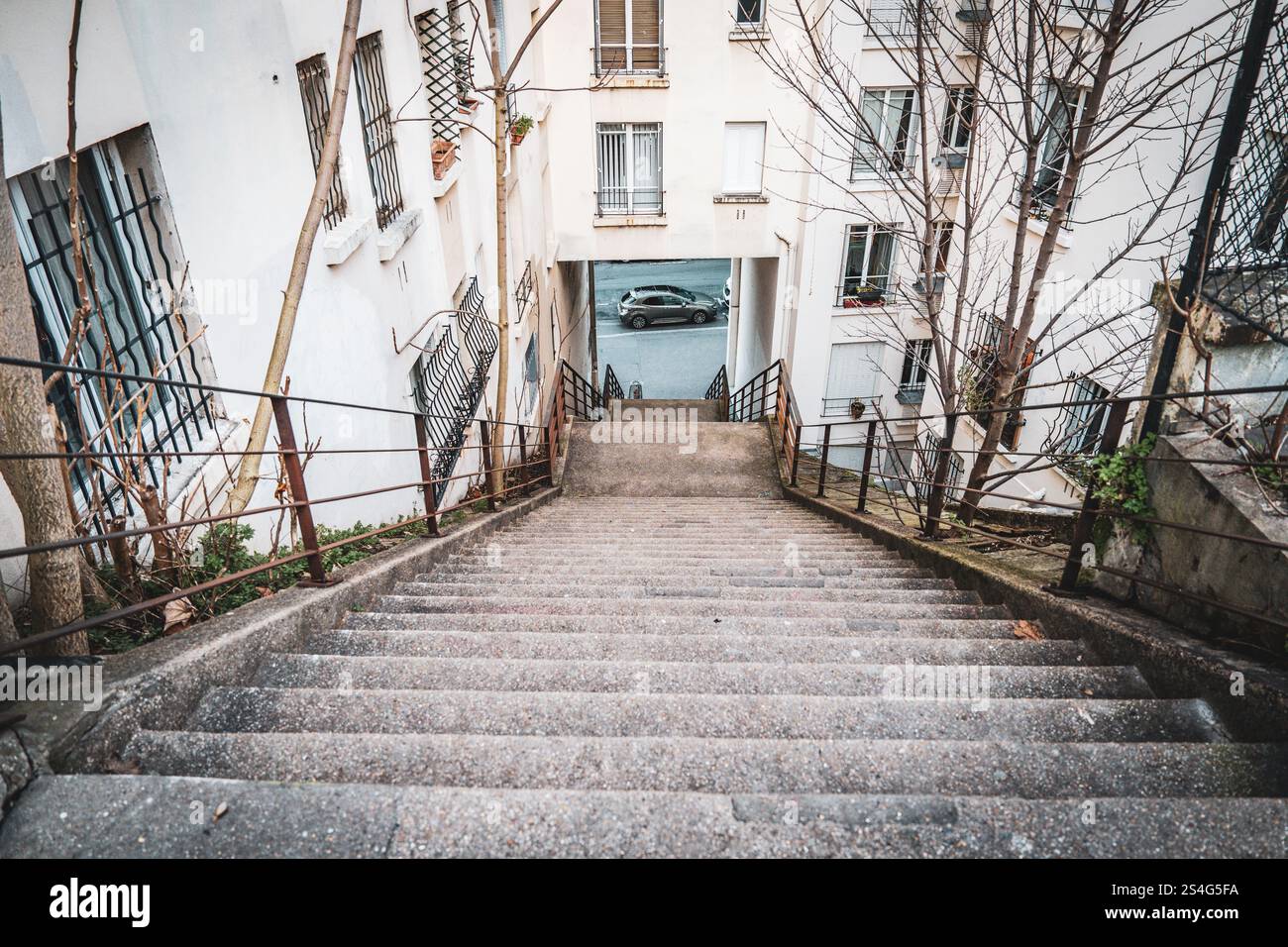 Steps leading down to a quiet street in a residential area Stock Photo ...