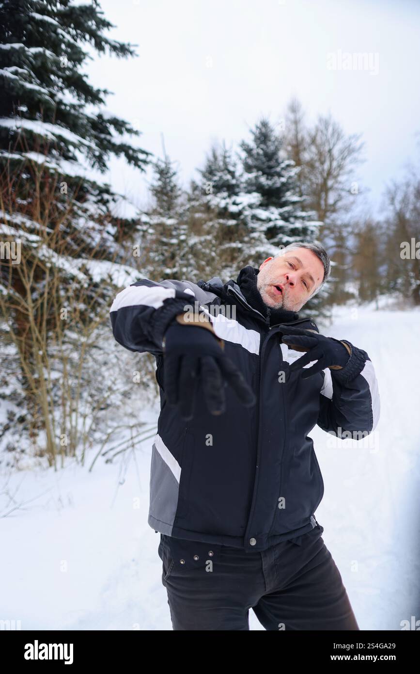 Happy elderly man in the winter forest jokes like he's a rapper Stock ...