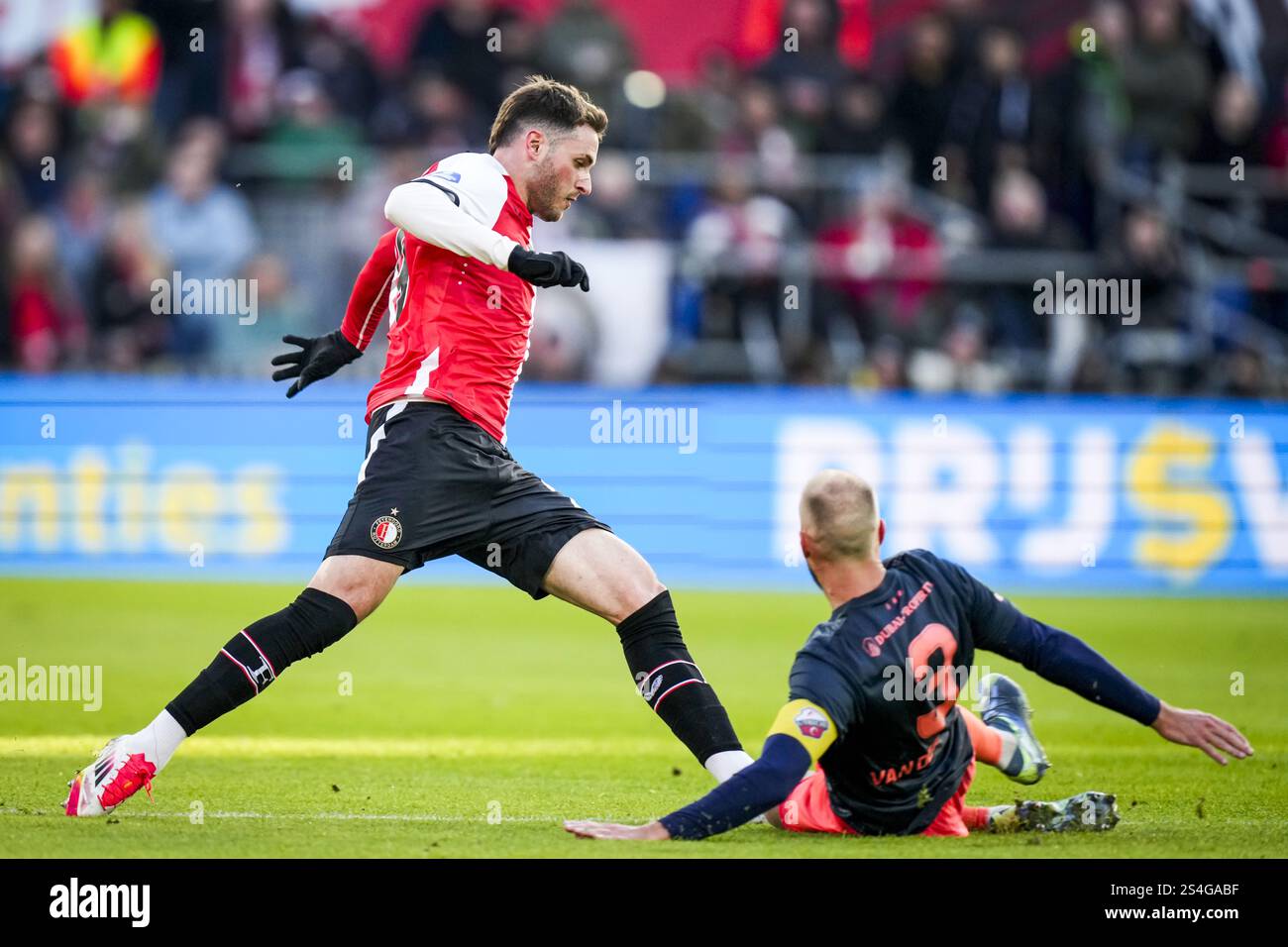 Rotterdam, The Netherlands. 12th Jan, 2025. Rotterdam - Santiago Gimenez of Feyenoord, Mike van ...
