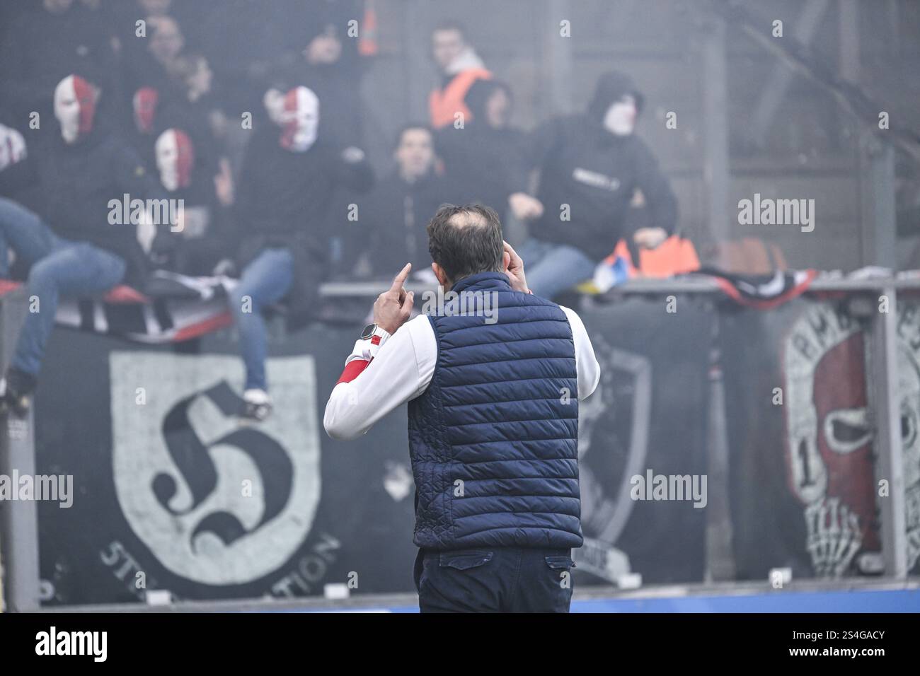 Antwerp, Belgium. 12th Jan, 2025. Antwerp's head coach Jonas De Roeck ...