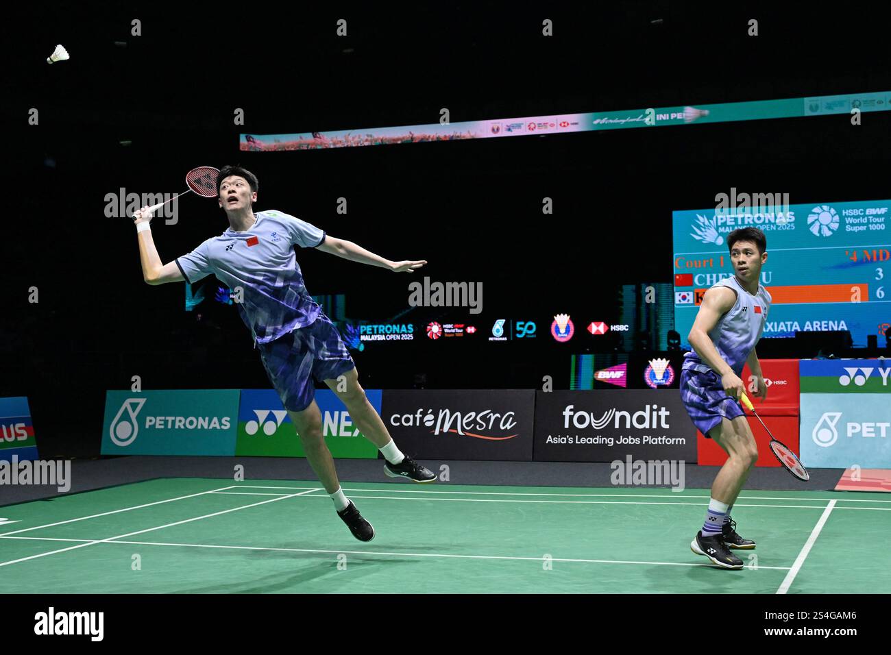 Kuala Lumpur, Malaysia. 12th Jan, 2025. Chen Boyang (L) /Liu Yi compete ...