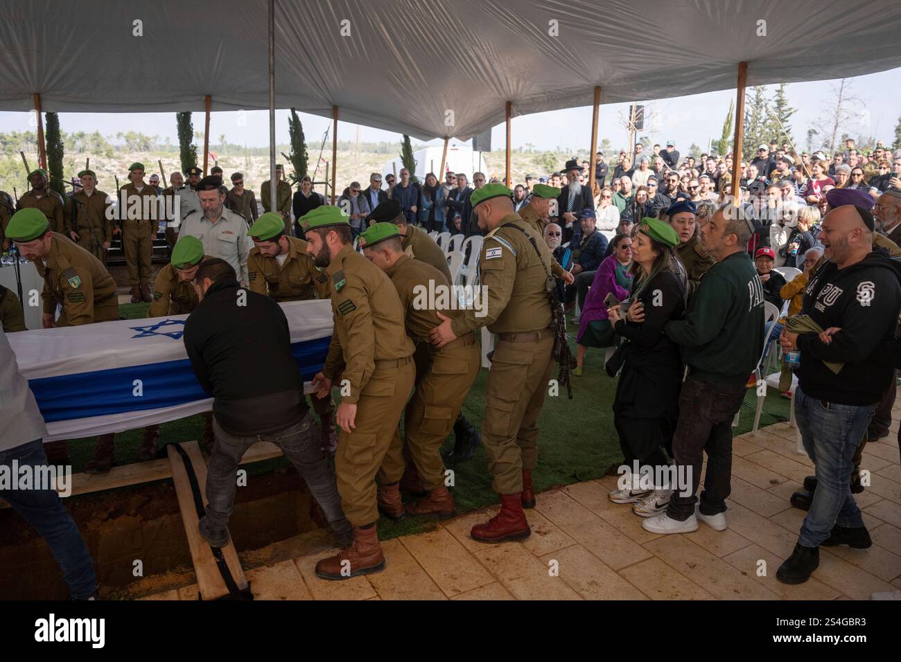 Israeli soldiers and relatives carry the flag-draped casket of Sergeant ...