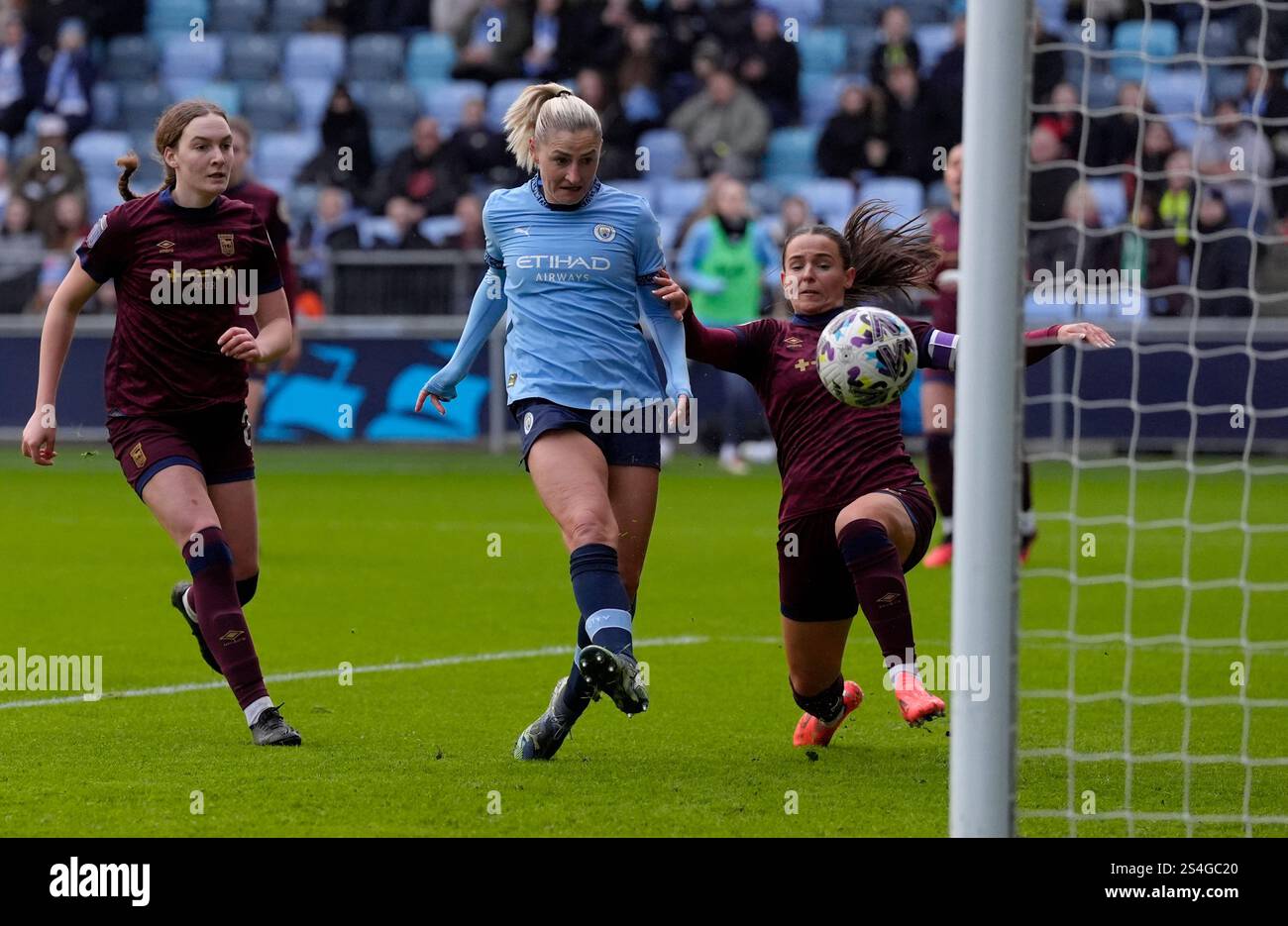 Manchester City's Laura Coombs scores their side's second goal of the ...