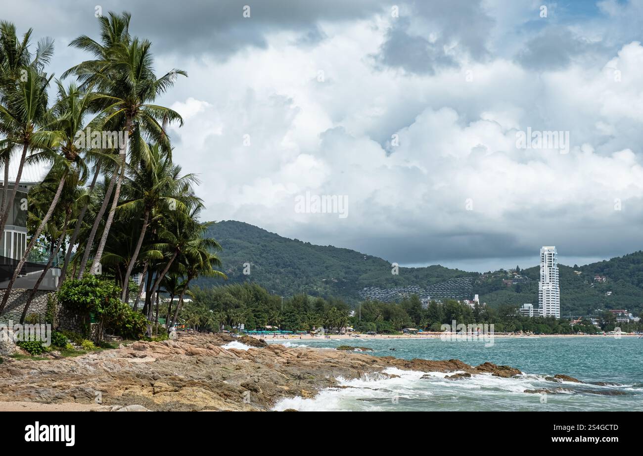 A beach with a beautiful coast, palm trees and the Andaman Sea ...