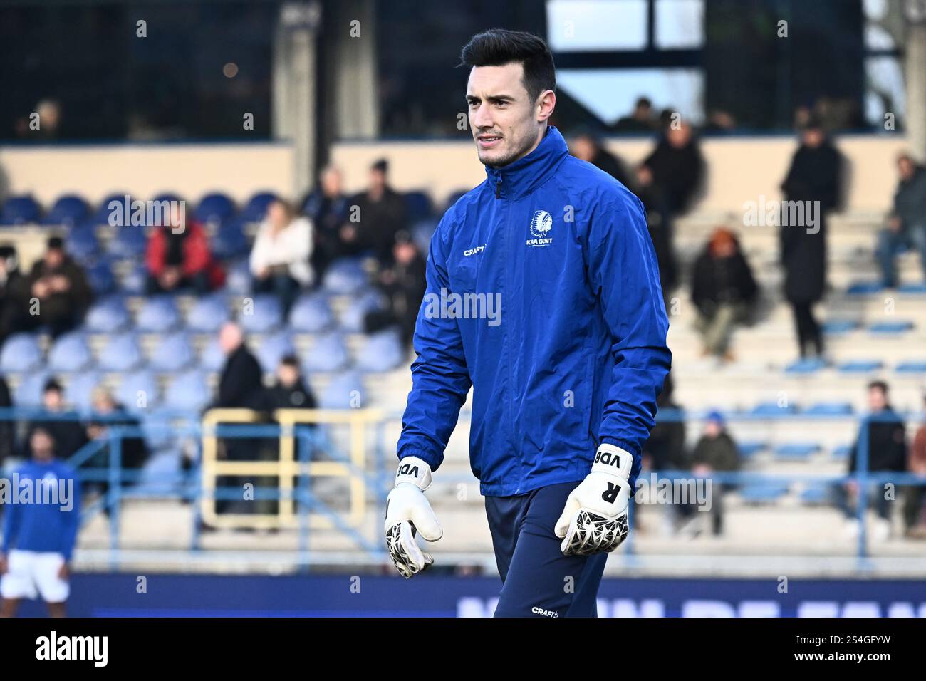 Dernderleeuw, Belgium. 12th Jan, 2025. Gent's goalkeeper Tom ...