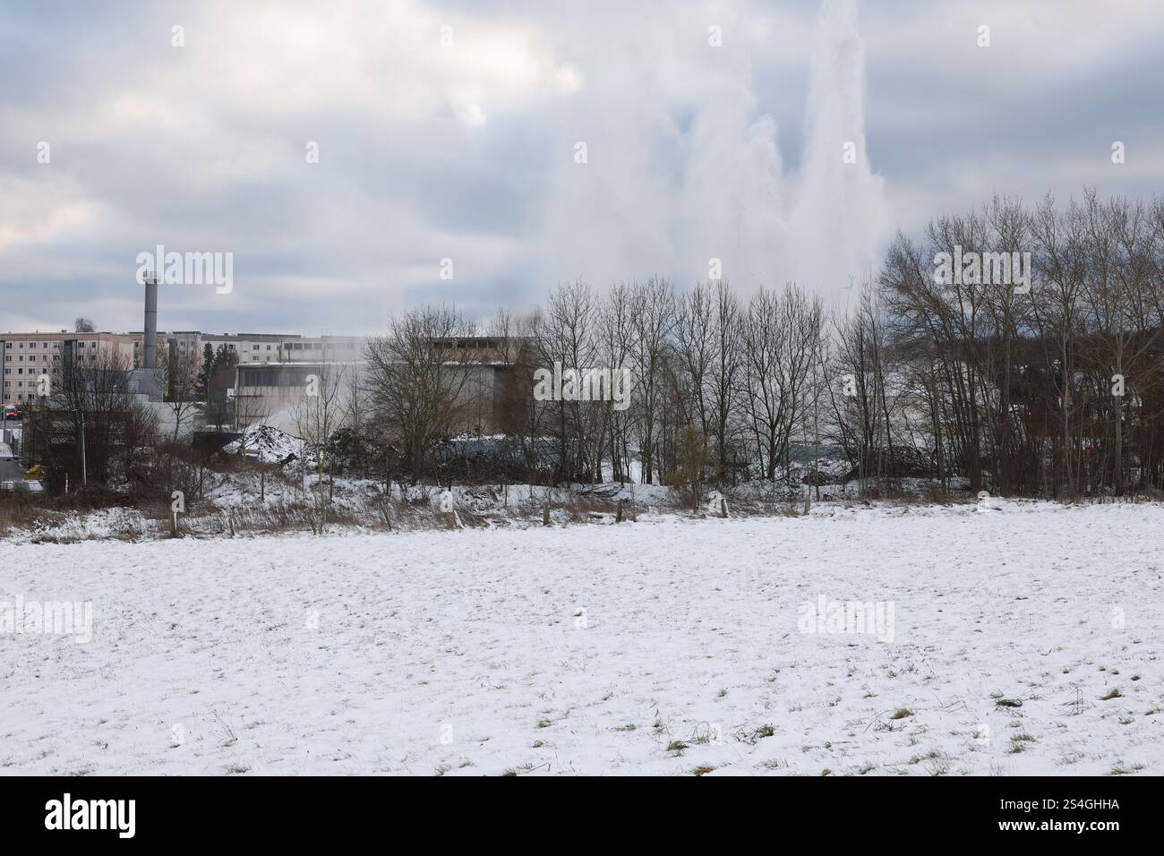 Eisenberg, Germany. 12th Jan, 2025. A 60-metre-high chimney was blown ...