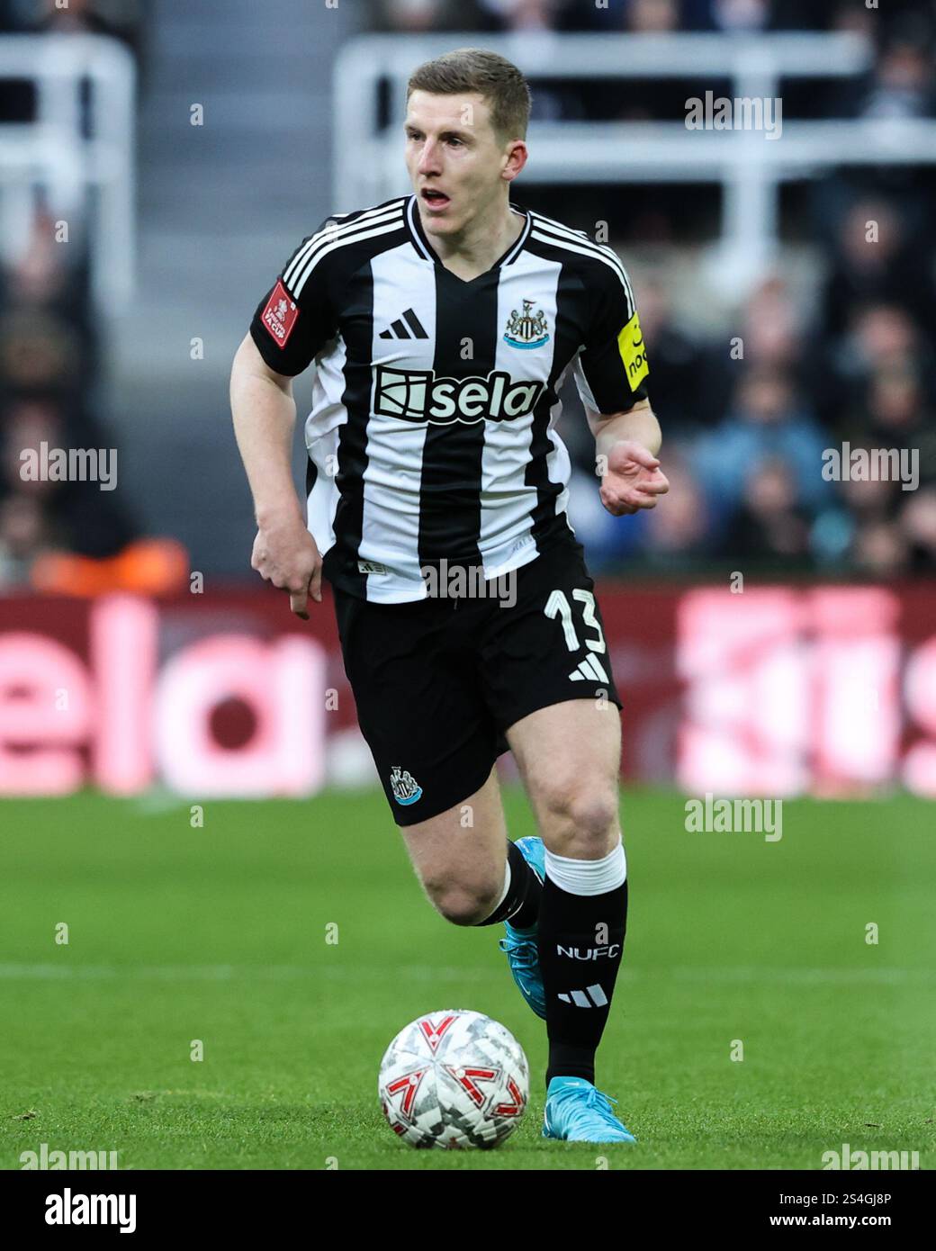 Newcastle, UK. 12th Jan, 2025. Matt Targett of Newcastle United goes ...