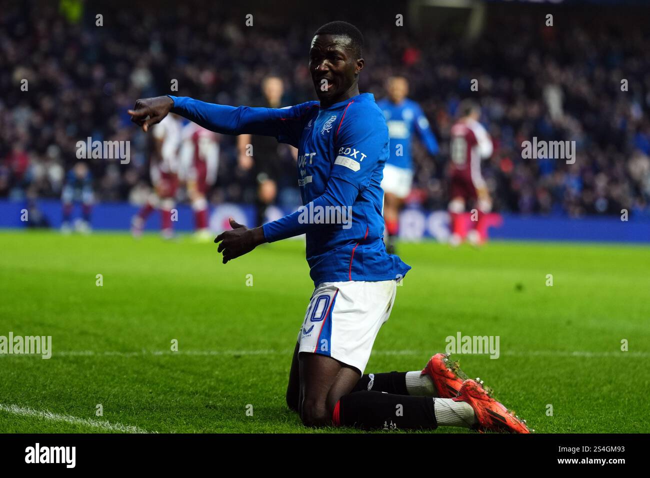 Rangers’ Mohamed Diomande (left) celebrates scoring their side's third ...