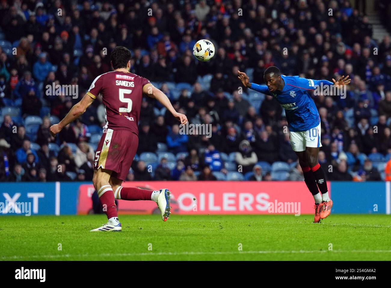 Rangers’ Mohamed Diomande (right) scores their side's third goal of the ...