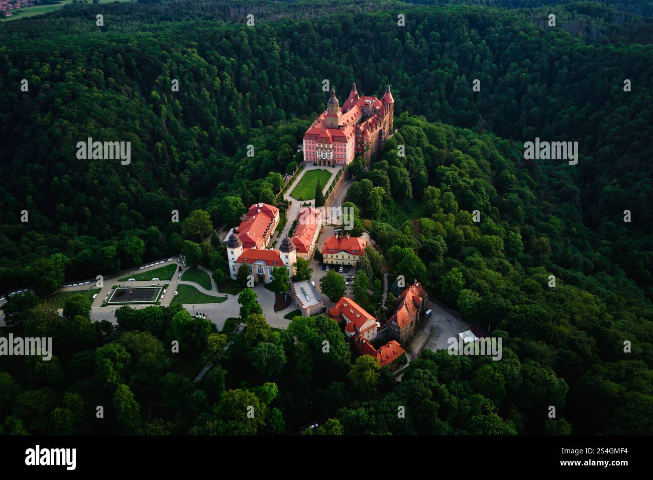 Aerial view of historic medieval castle surrounded by forest. Ksiaz ...