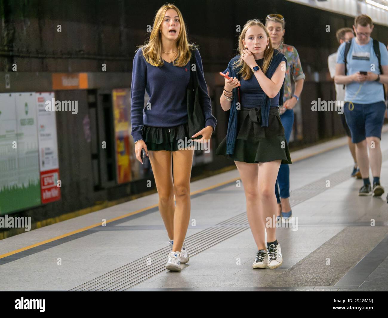 Two Young Teenage Girls Walking by Subway Rails Stock Photo - Alamy