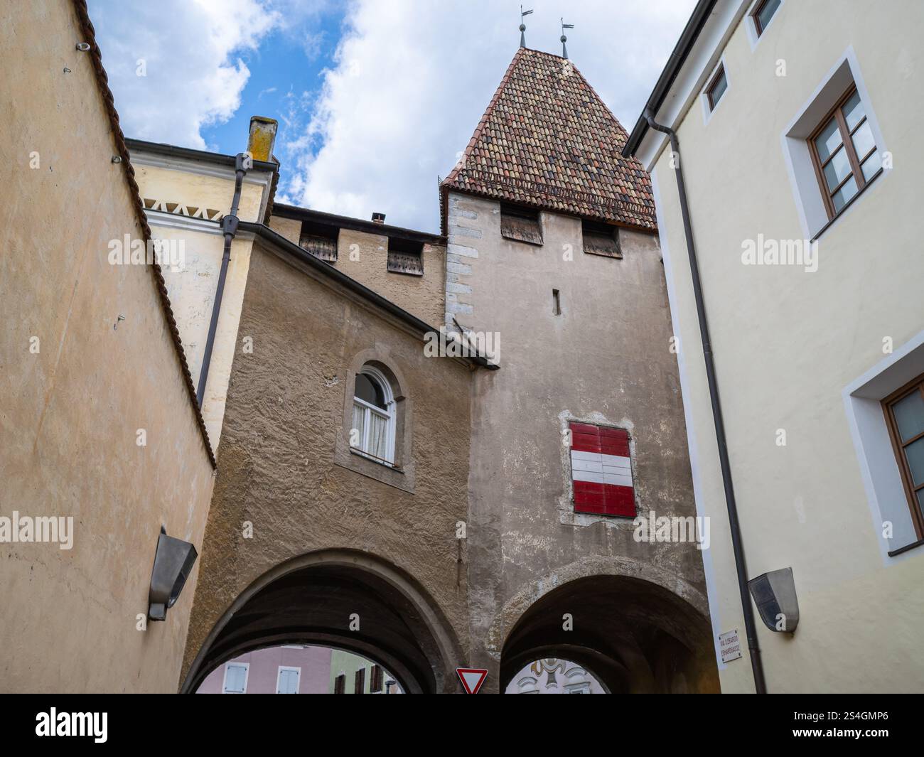 The Ancient Gateway Towering Over the Cobblestone Street in Bressanone ...