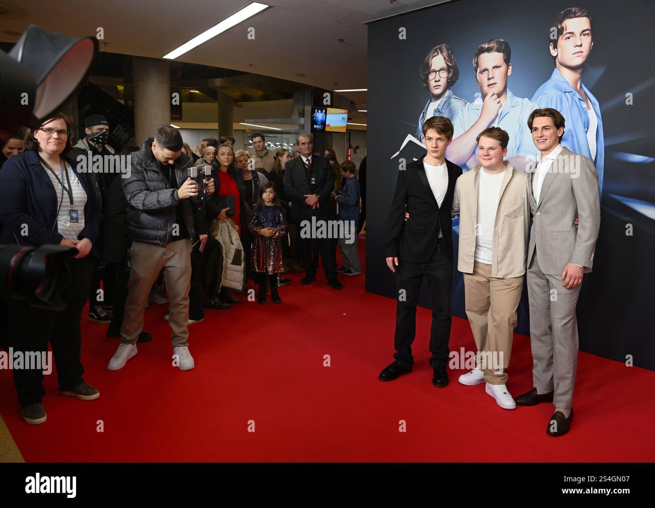 12 January 2025, Bavaria, Munich: Actors Levi Brandl (l-r), Julius Weckauf and Nevio Wendt stand ...