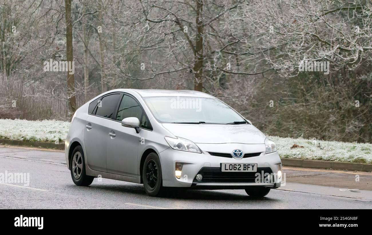 Milton Keynes,UK - Jan 12th 2025: 2912 Toyota Prius hybrid electric car ...