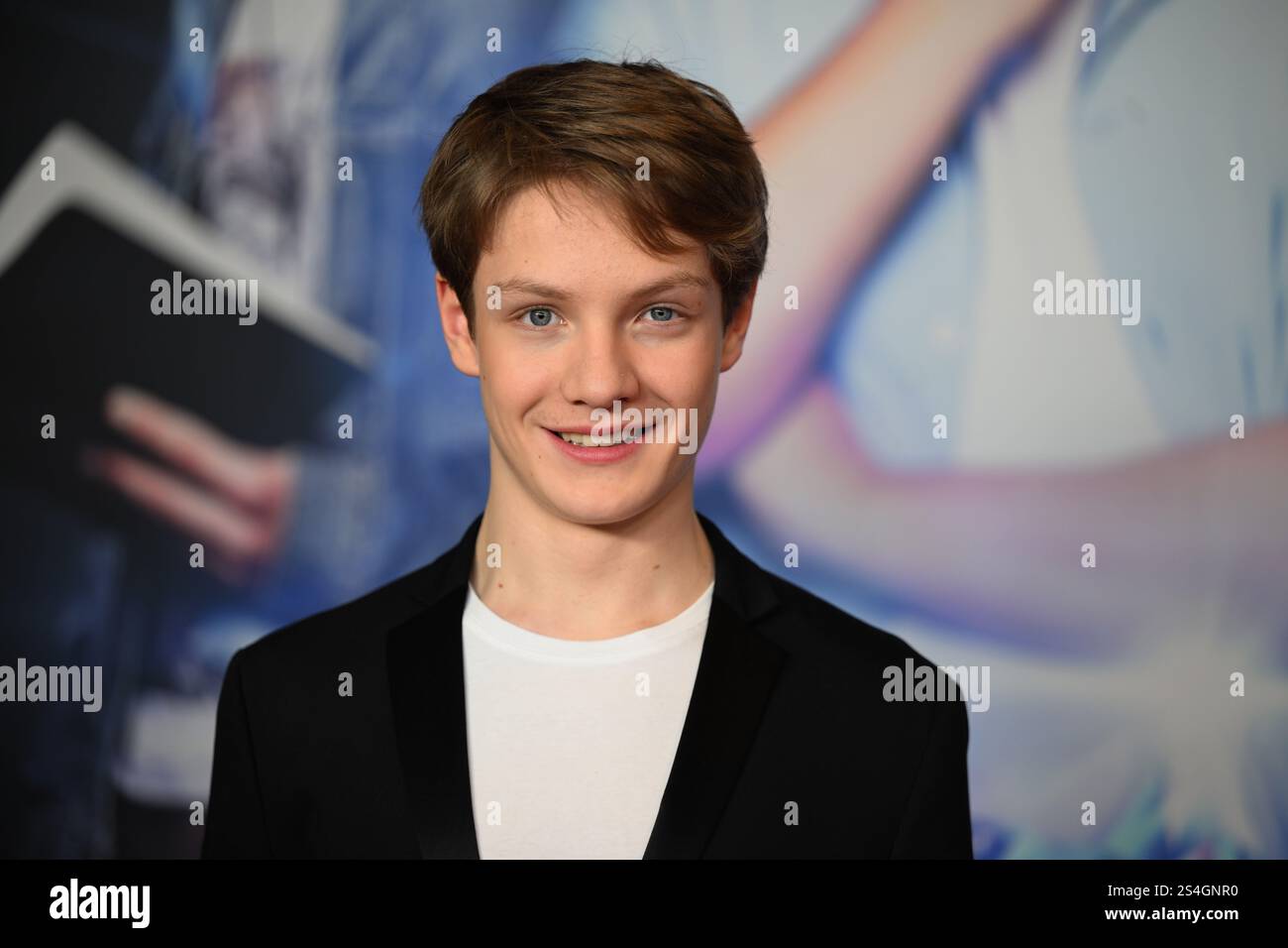 Munich, Germany. 12th Jan, 2025. Actor Levi Brandl stands on the red carpet at the world ...