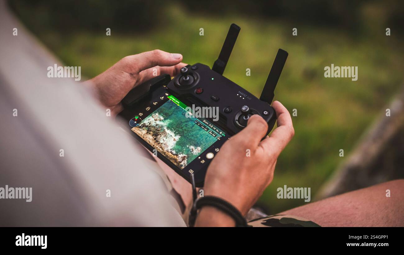Man holding remote control drone hi-res stock photography and images - Alamy