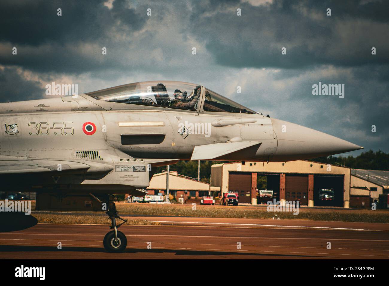 a fighter jet on an airport getting ready to take off Stock Photo - Alamy