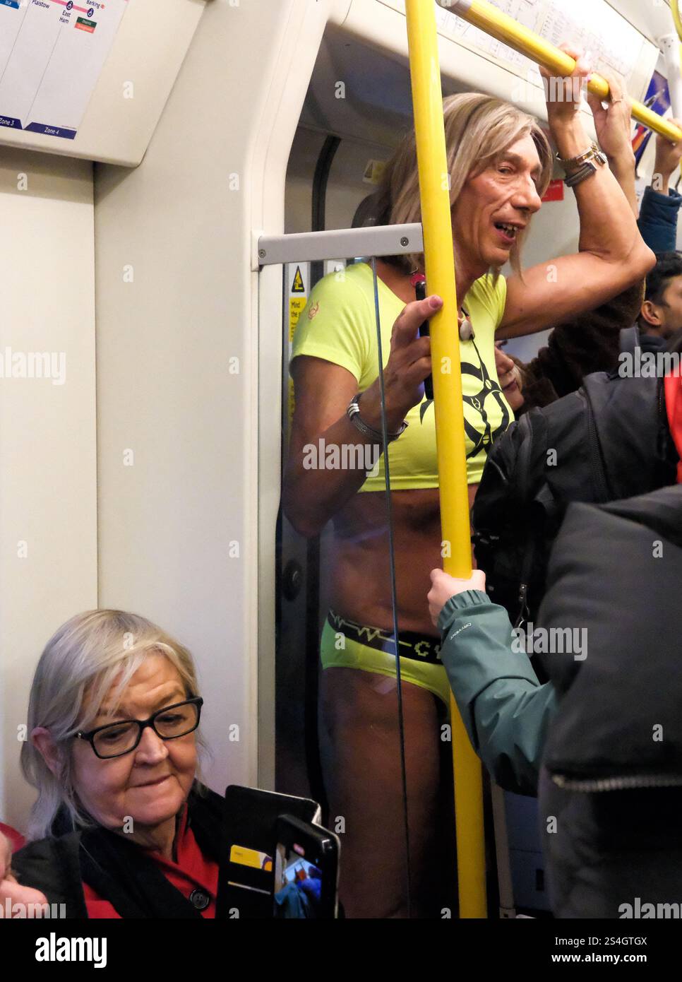 London, UK. 12th Jan 2025 People take part in the 2025 No Trousers Tube ...