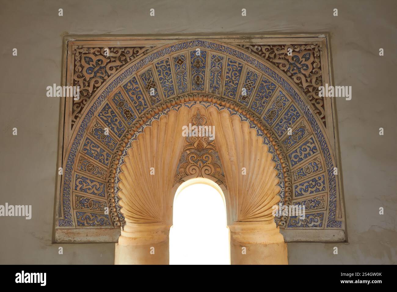Historic Arched Window with Ornamental Frame Overlooking Scenic Garden ...