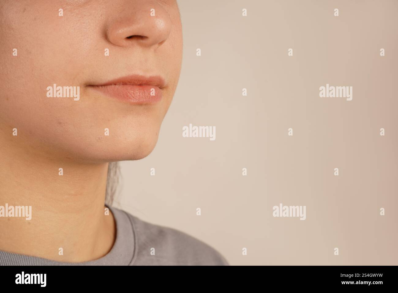 Close-up shot of a young girl's chin. Detailed depiction of the chin ...