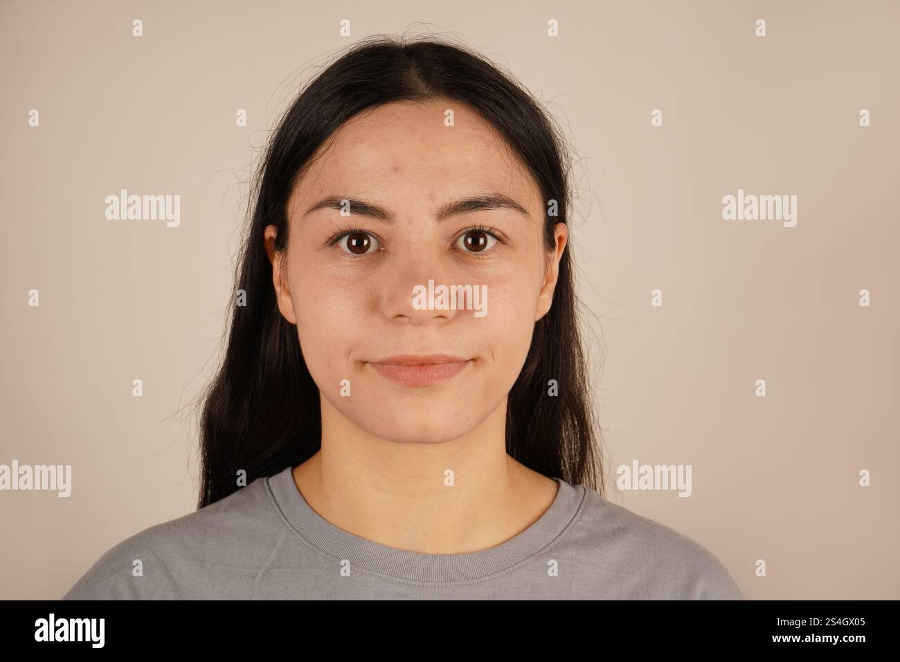 The woman s face is captured in a close-up, radiating relaxation and ...
