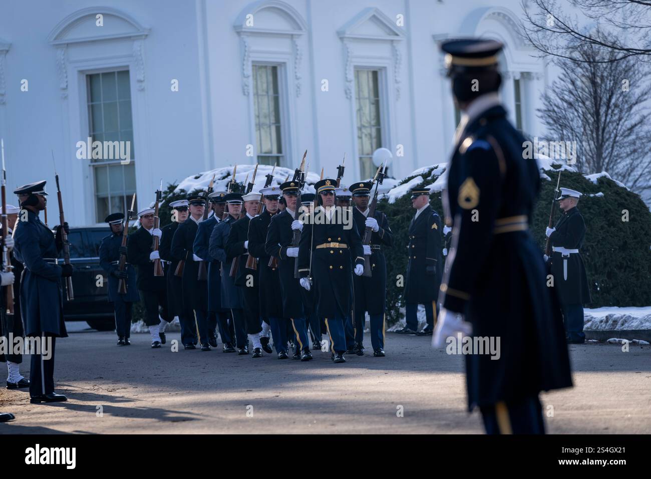 Members of the U.S. military Joint Honor Guard parade as they rehearse ...