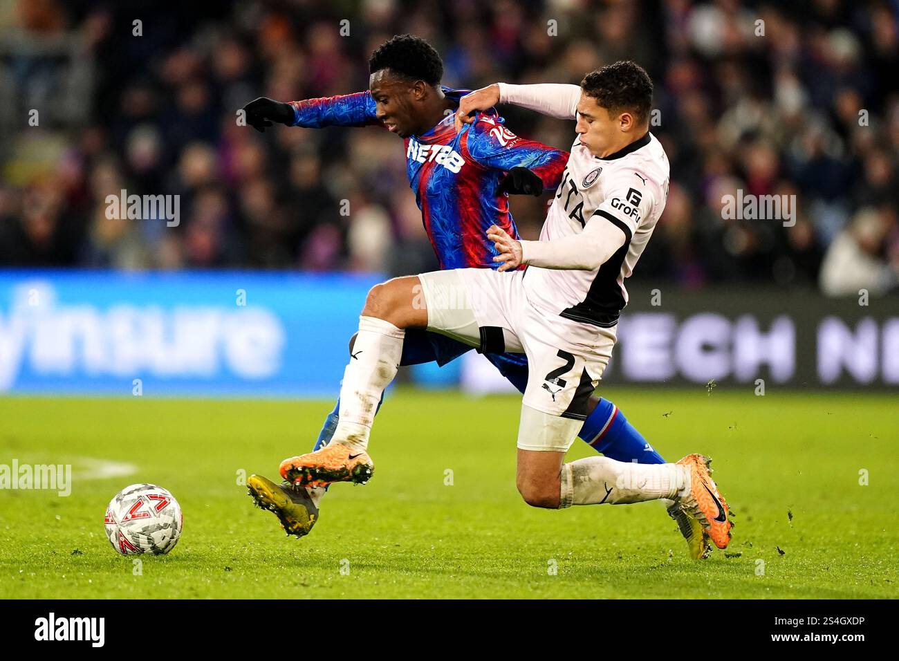 Crystal Palace's Eddie Nketiah (left) and Stockport County's Kyle ...