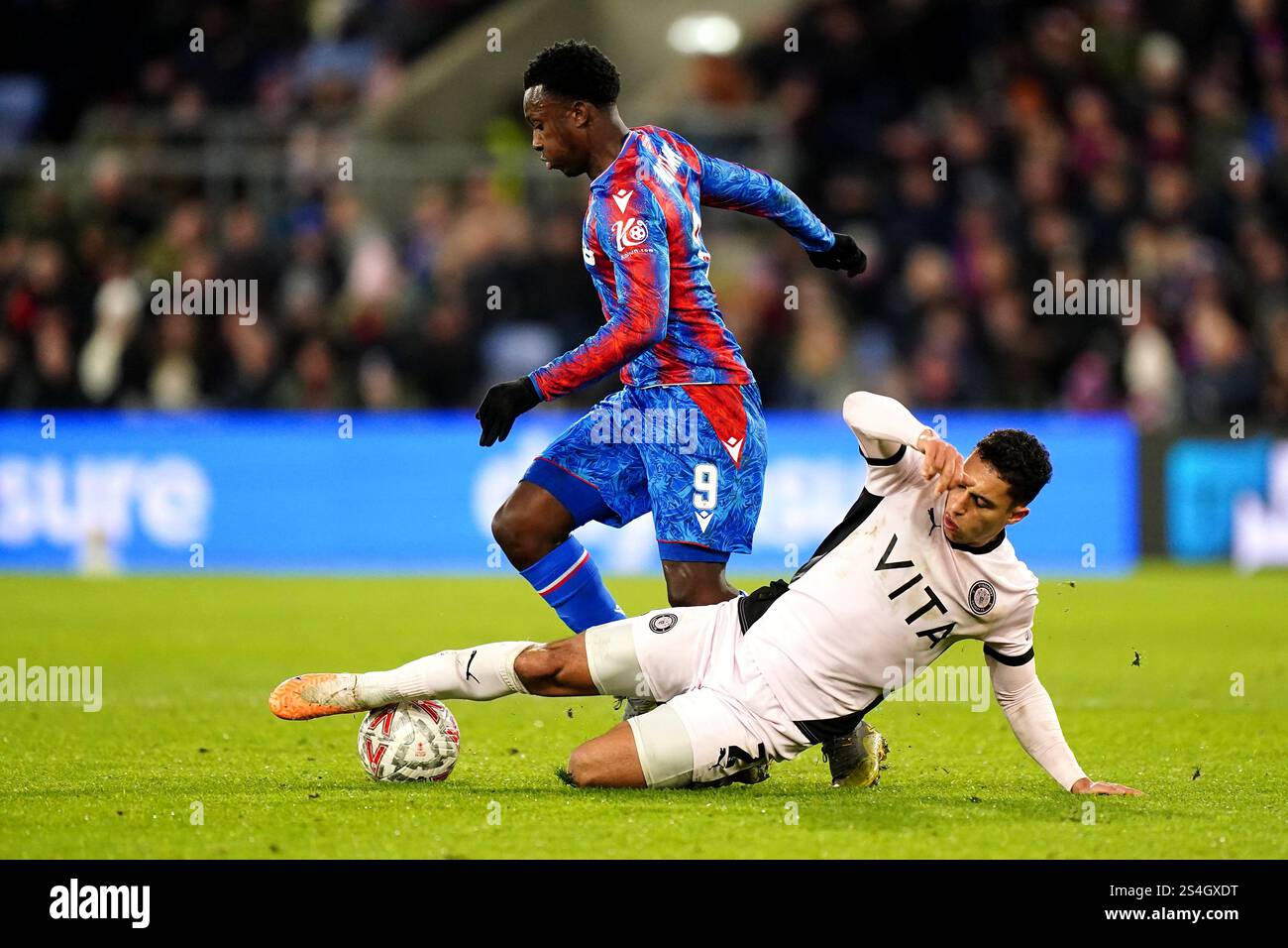 Crystal Palace's Eddie Nketiah (left) and Stockport County's Kyle ...
