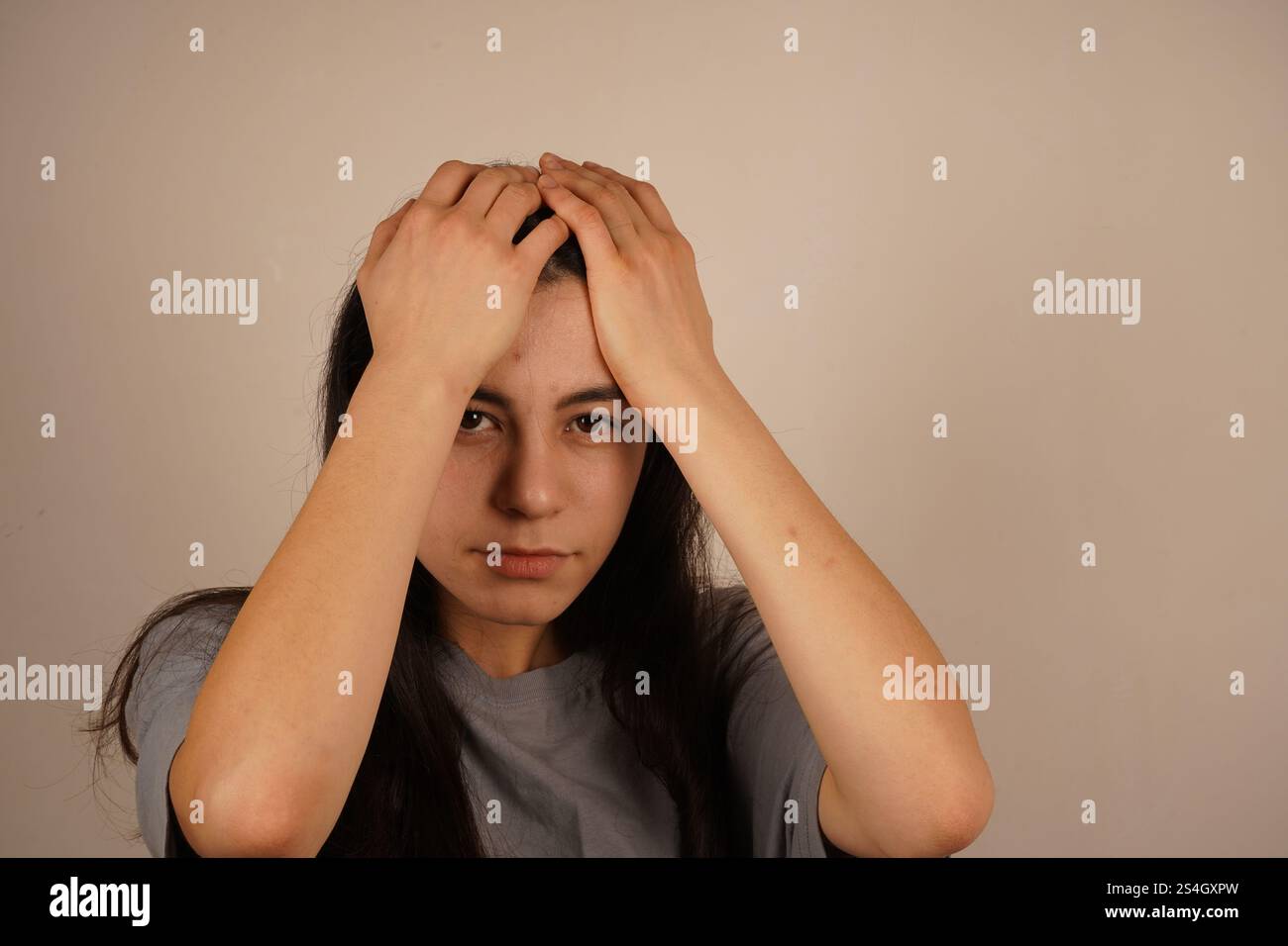 Her body language conveys a sense of realization. This moment captures ...