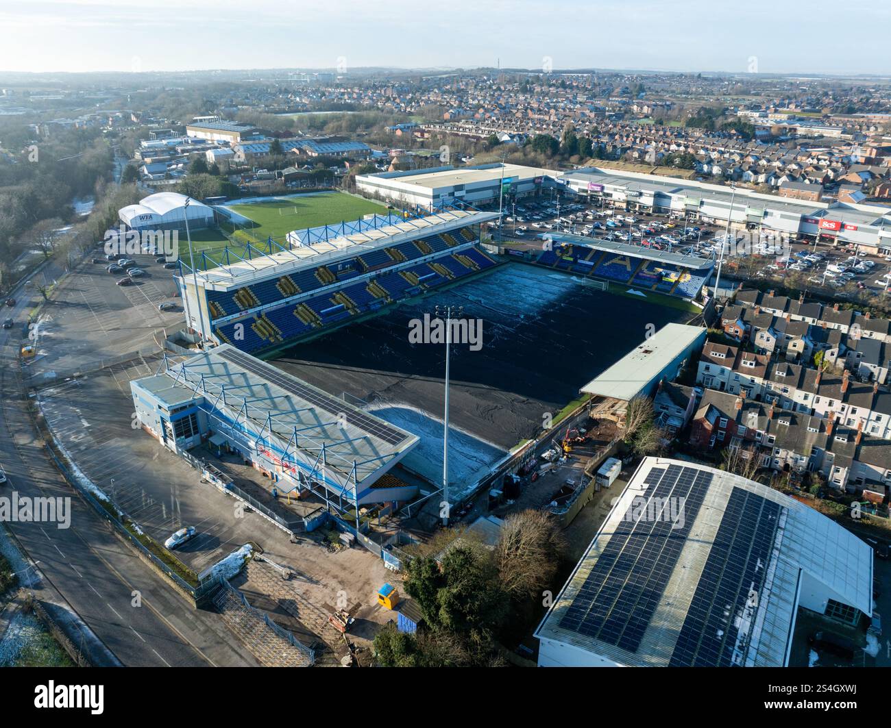 Mansfield Town's Field Mill Stadium, with pitch covered to protect from ...