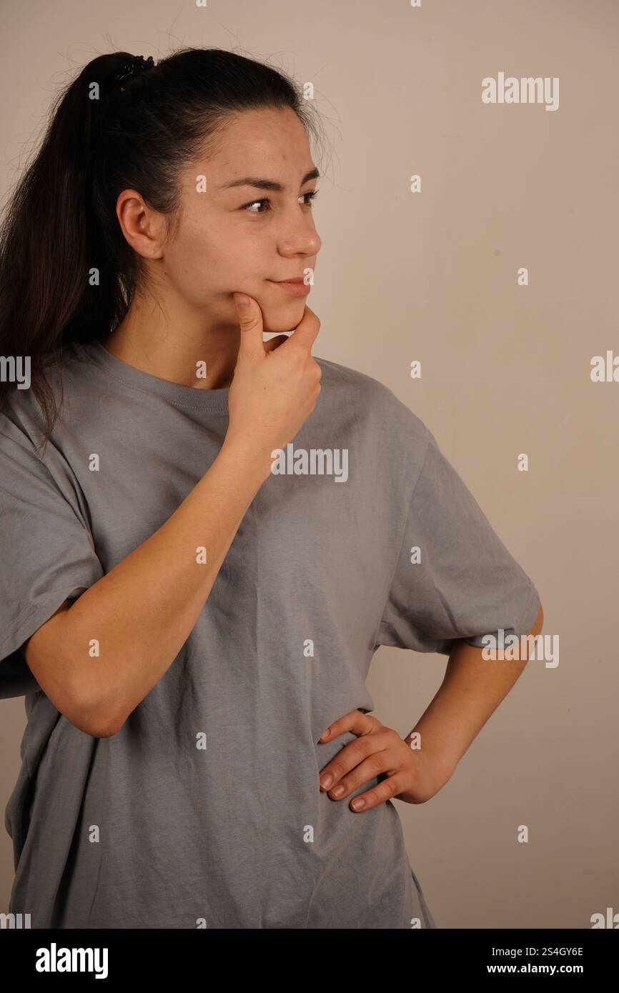 This pose depicts contemplation and inner concentration. With her chin ...