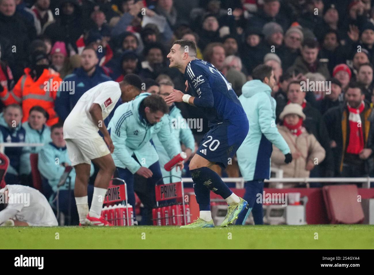Manchester United's Diogo Dalot reacts after receiving a red card ...