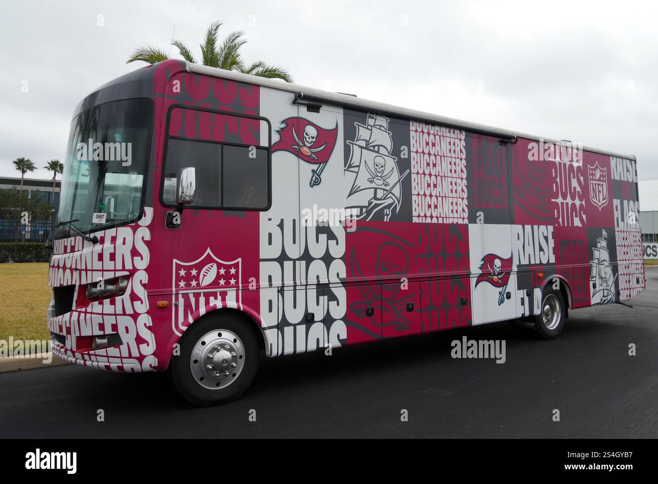 A bus with Tampa Bay Buccaneers signage at the Buccaneers headquarters ...