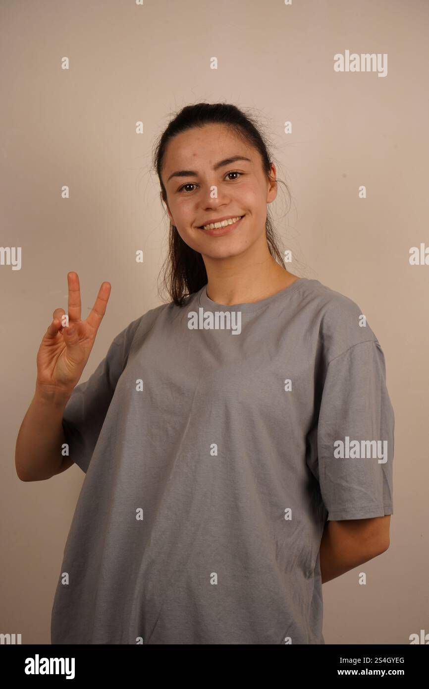 This gesture is a universal symbol for peace and understanding, often ...