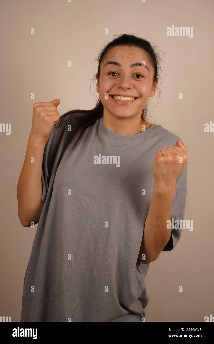 The gesture exudes strength and confidence, showing the person’s ...