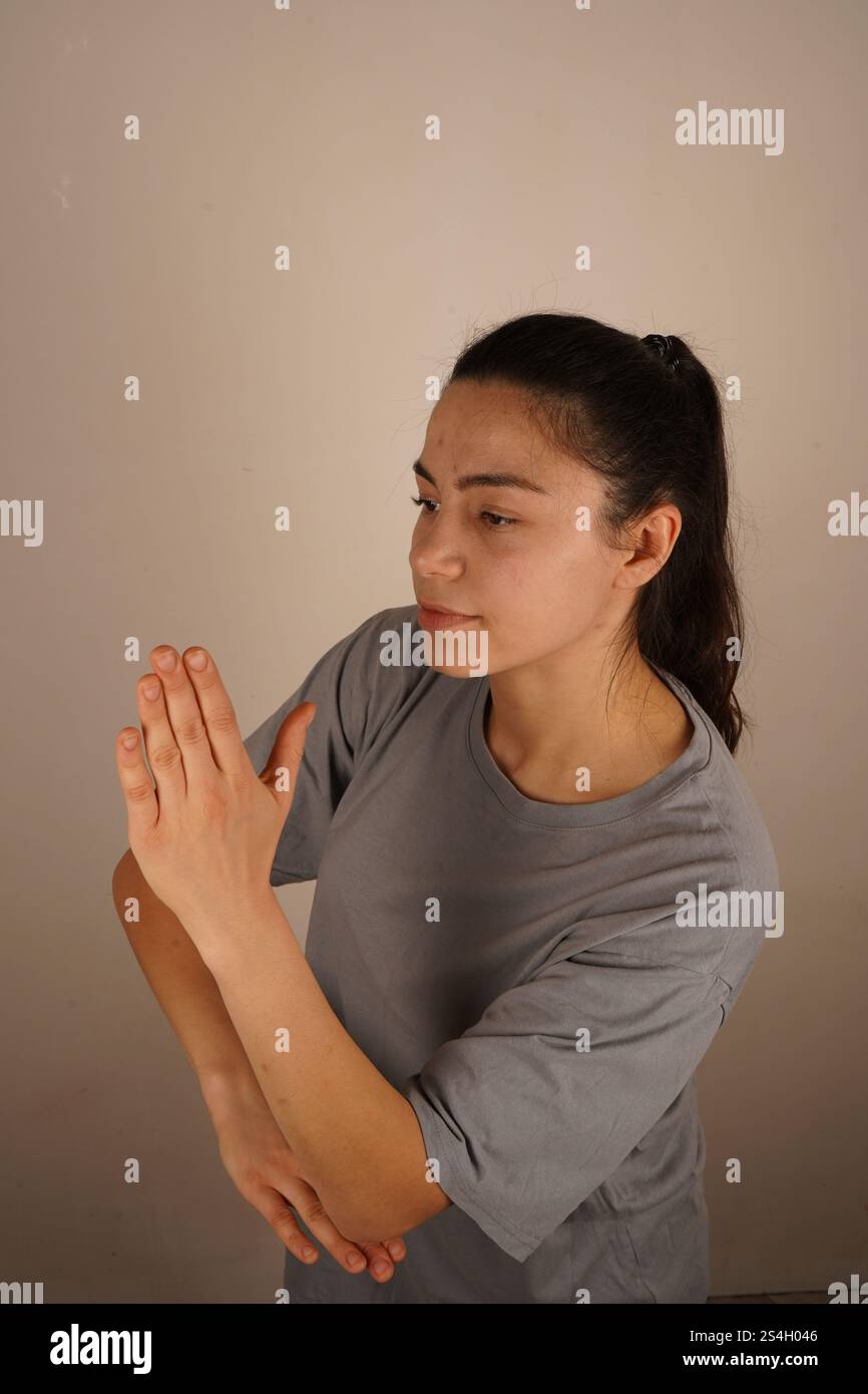 A classic gesture in a learning environment. A student raises a hand ...