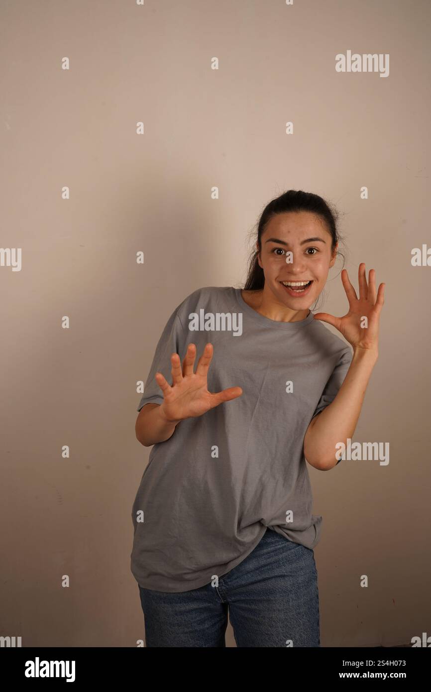 With arms spread out to the sides, this gesture symbolizes surprise ...