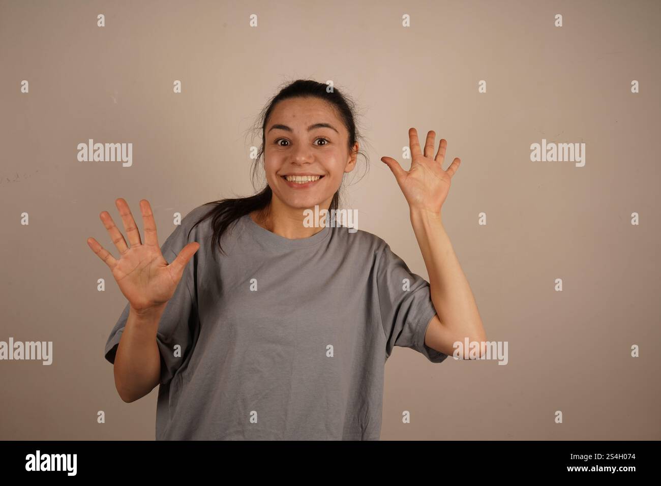 The arms are spread wide, expressing the emotion of surprise. This ...