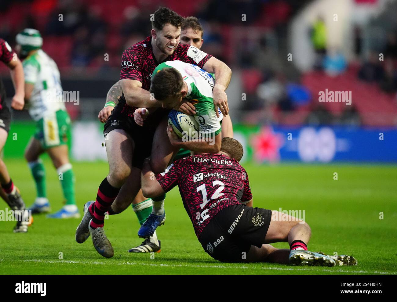 Benetton's Matt Gallagher is tackled by Bristol Bears' James Williams ...