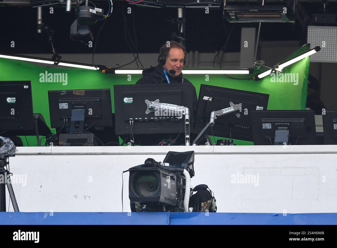 CBS broadcaster Jim Nantz prepares before an NFL football wild card ...