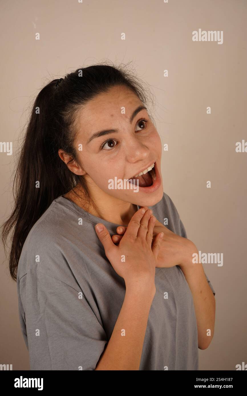 The expression captures a moment of sincere emotion and hope. The eyes ...