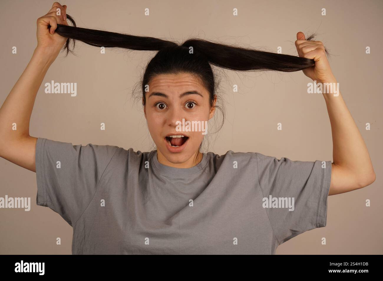 Gentle handling of the hairstyle. The composition emphasizes style and ...