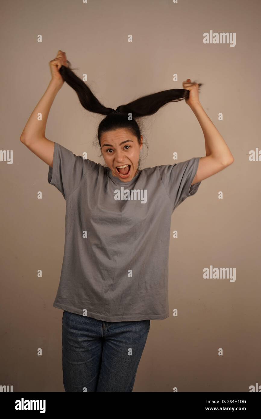 Gentle handling of the hairstyle. The composition emphasizes style and ...